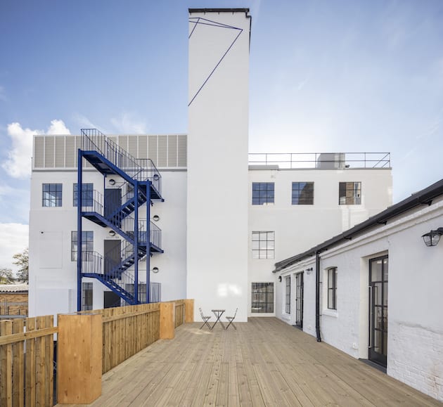 Studio RHE transforms a former vinyl factory into a creative hub ...